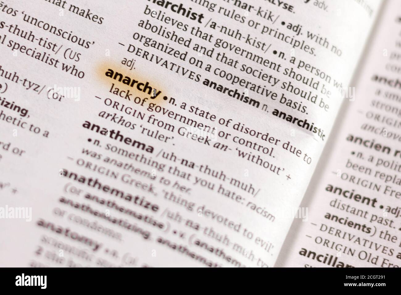 The word or phrase Anarchy in a dictionary highlighted with marker ...