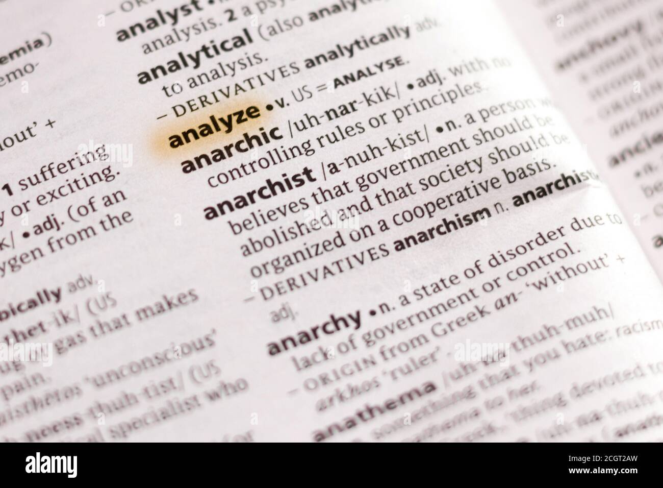 The word or phrase Analyze in a dictionary highlighted with marker ...
