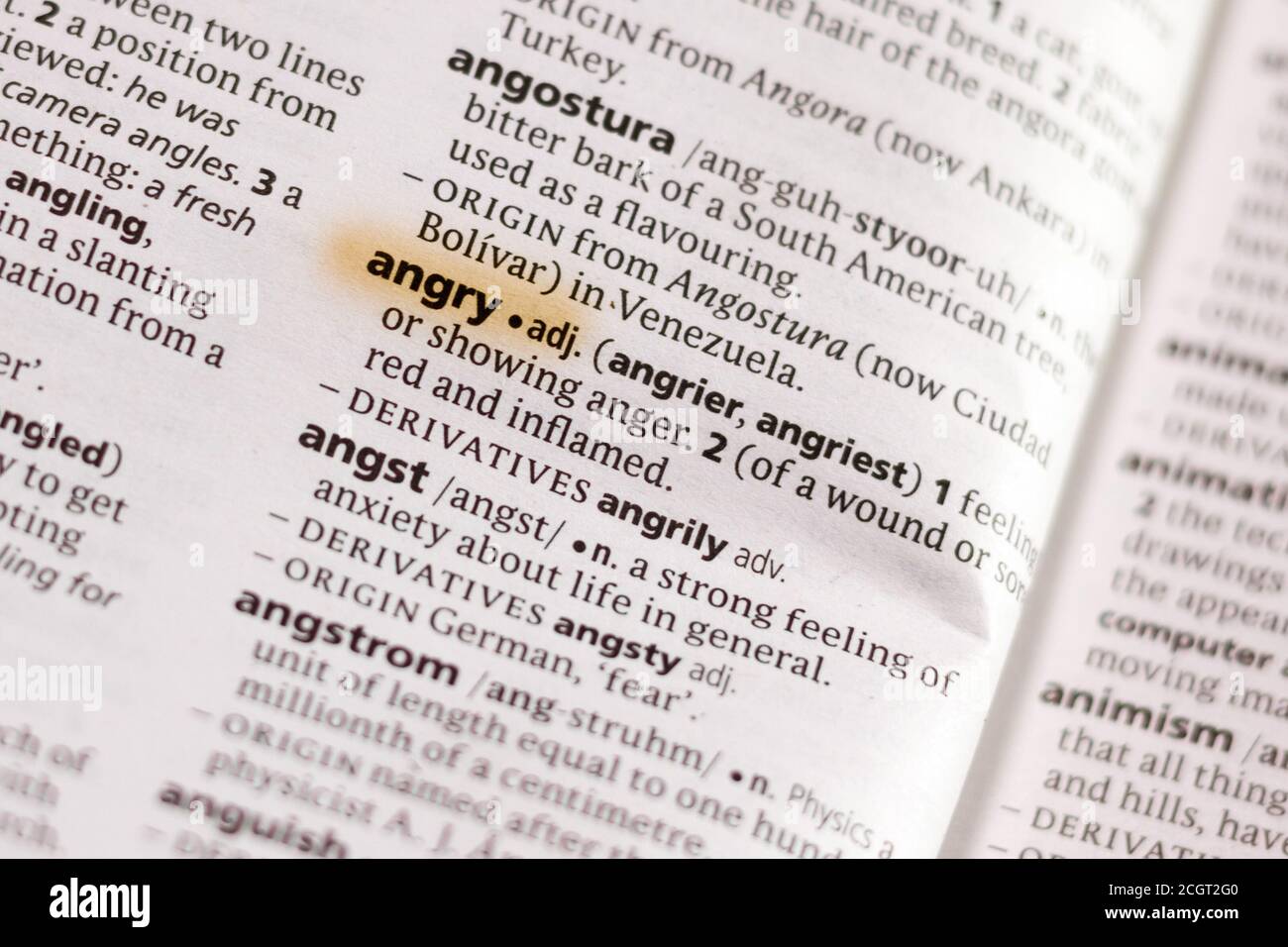 The word or phrase Angry in a dictionary highlighted with marker Stock ...