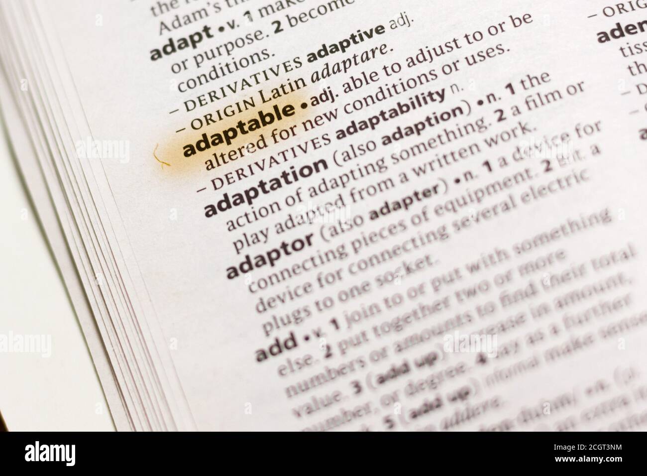 The word or phrase Adaptable in a dictionary highlighted with marker ...