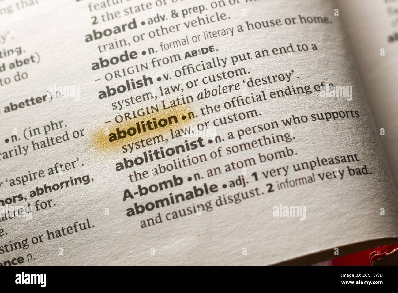 The word or phrase Abolition in a dictionary highlighted with marker ...