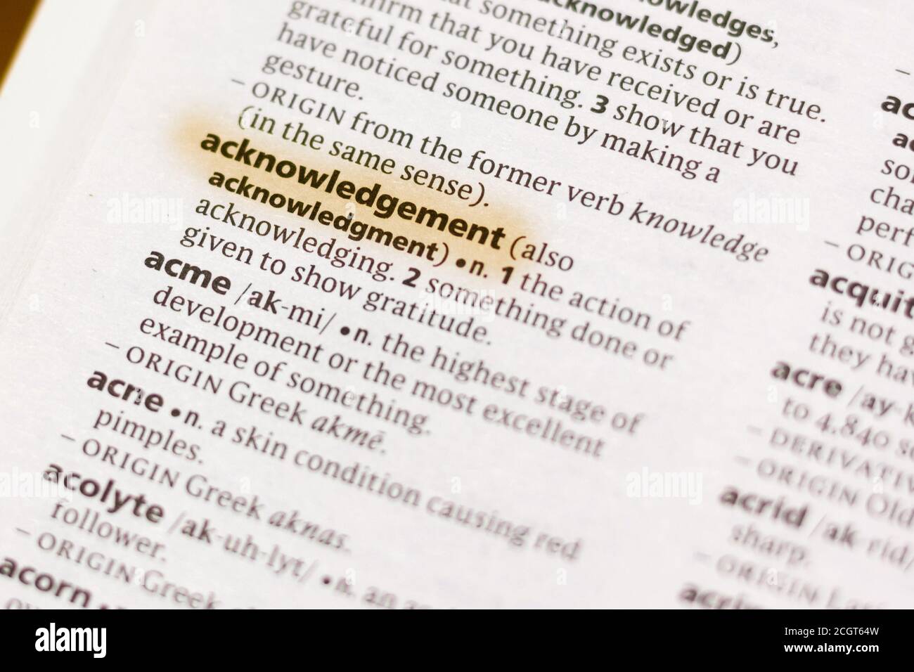 The word or phrase Acknowledgement in a dictionary highlighted with ...