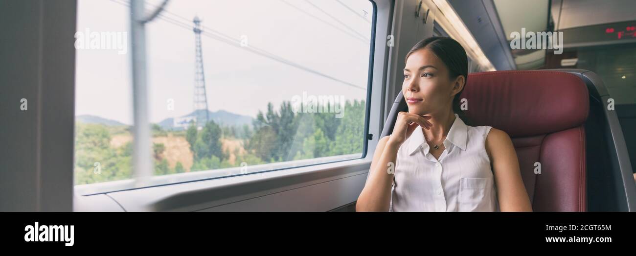 Girl looking out train window hi-res stock photography and images - Alamy