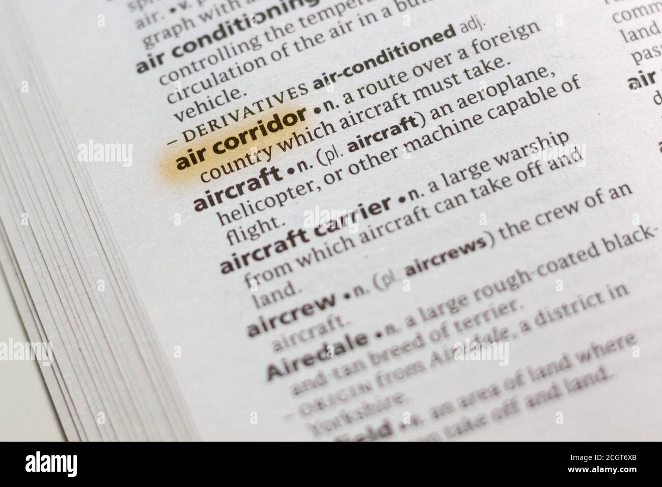 The word or phrase Air Corridor in a dictionary highlighted with marker ...