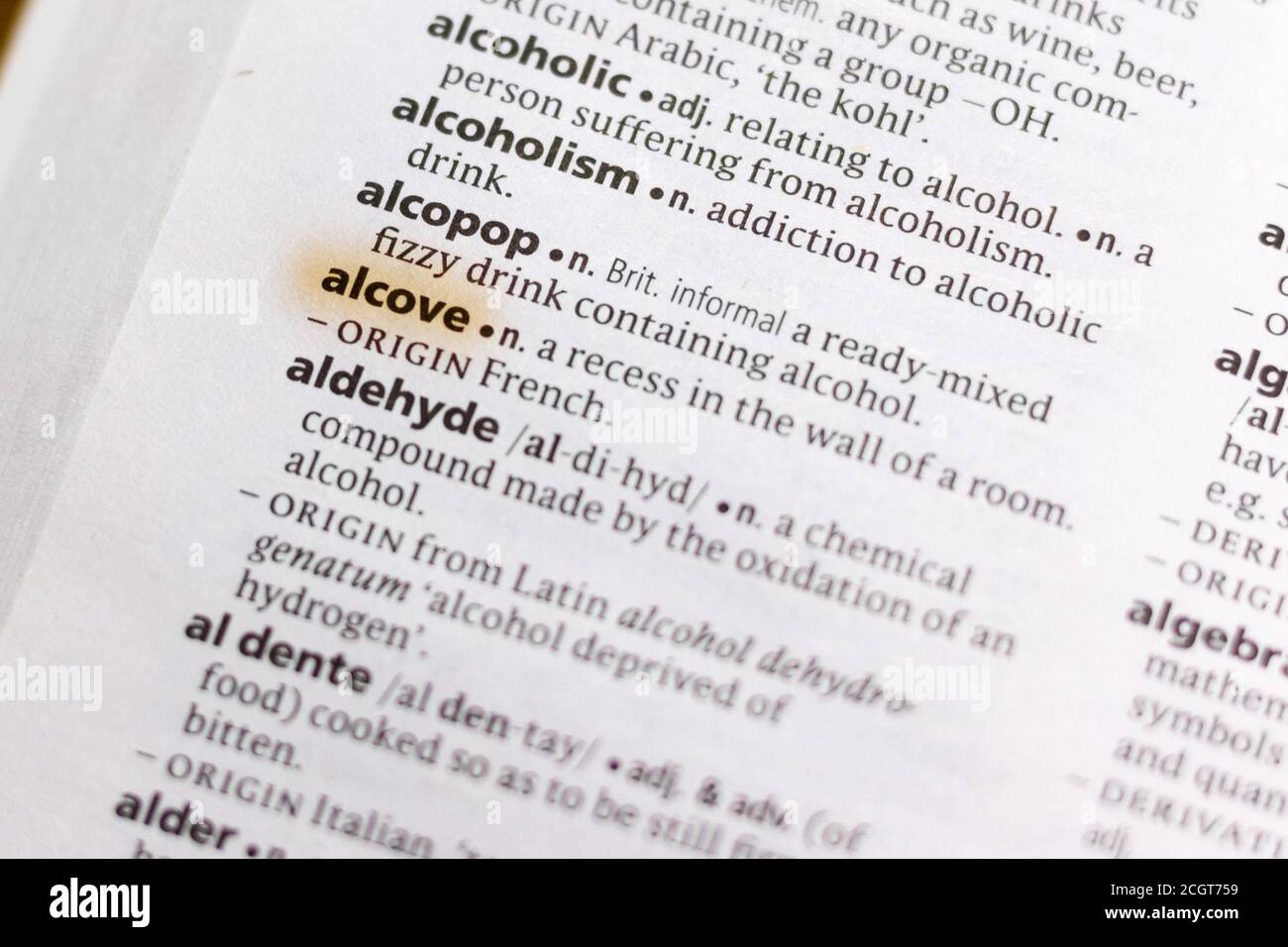 The word or phrase Alcove in a dictionary highlighted with marker Stock ...
