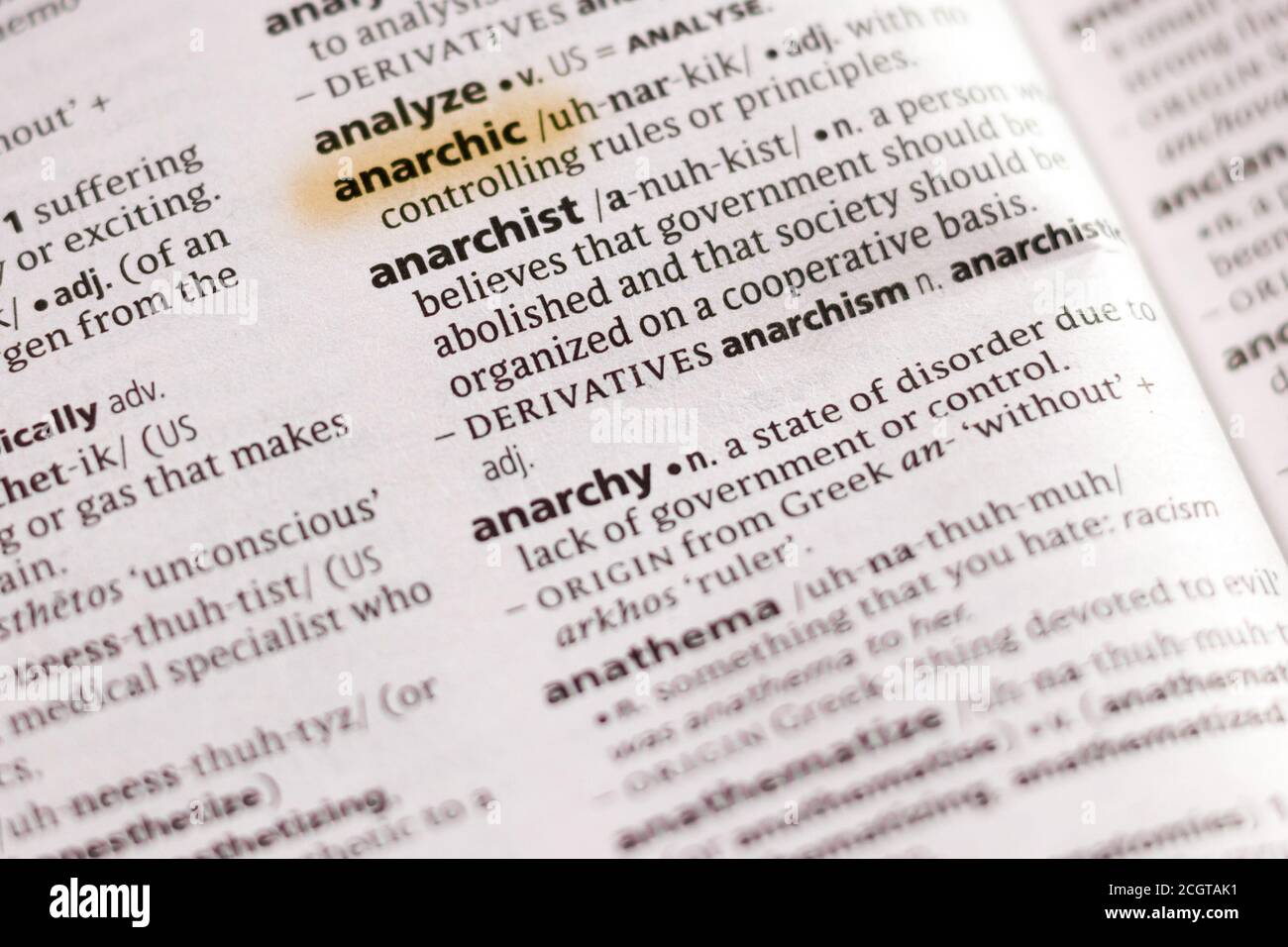 The word or phrase Anarchic in a dictionary highlighted with marker ...