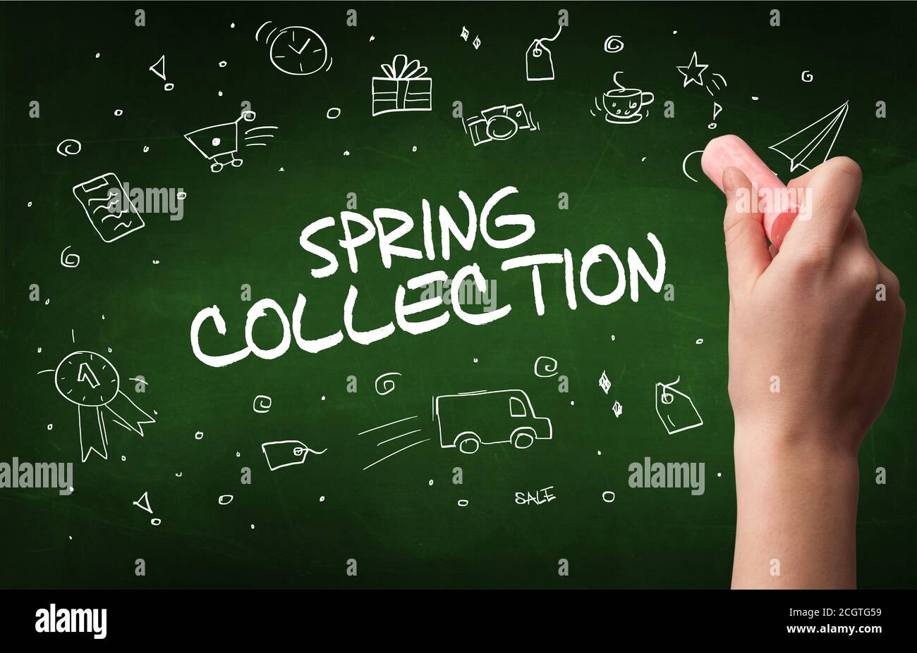 Hand drawing SPRING COLLECTION inscription with white chalk on ...