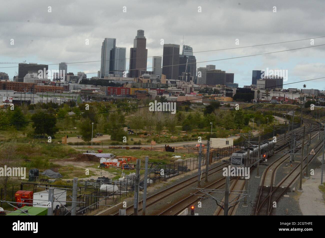 city scape of Los Angeles and metro rail (subway) going into downtown ...
