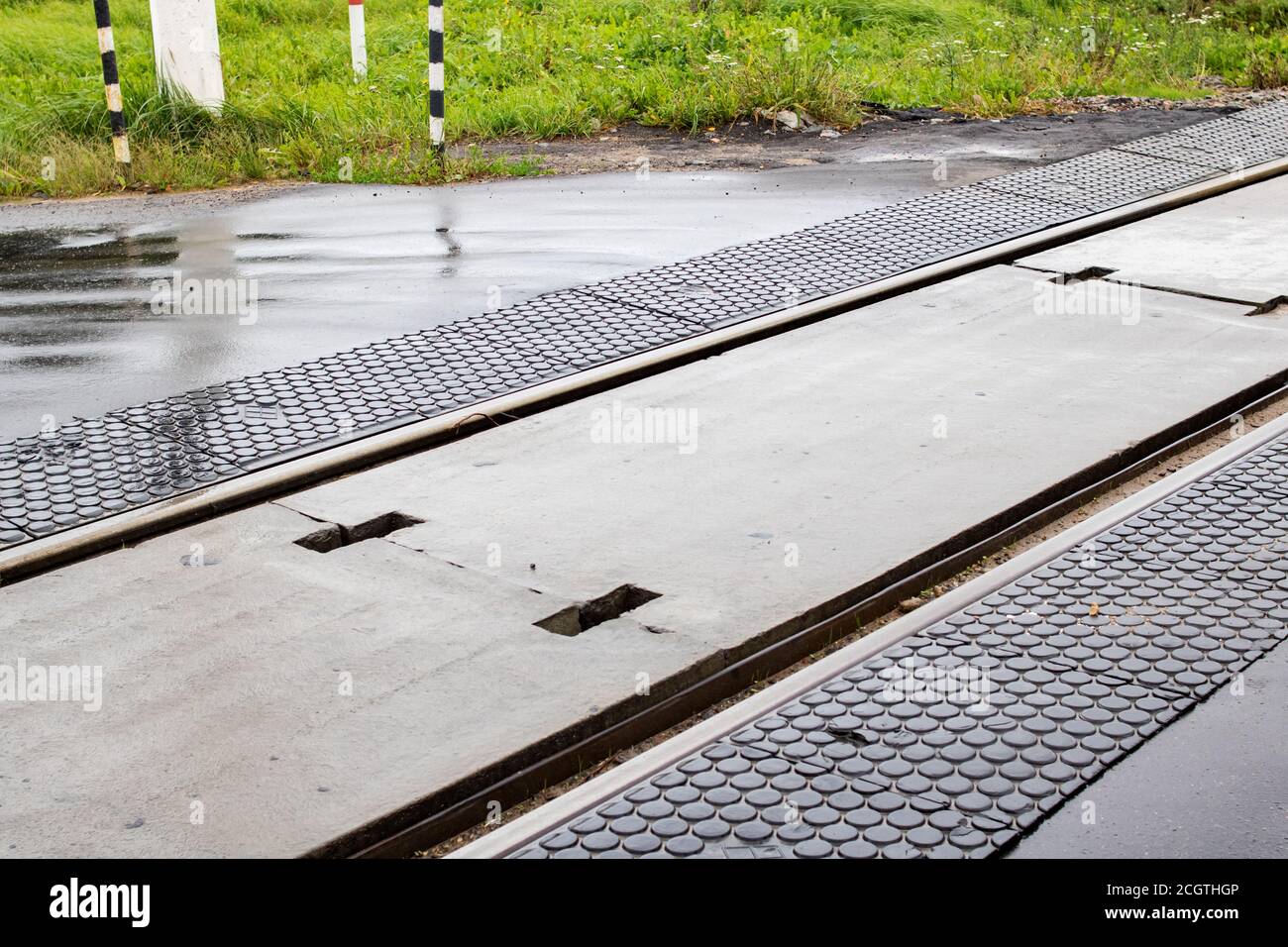 Railroad rails on the road close up Stock Photo - Alamy