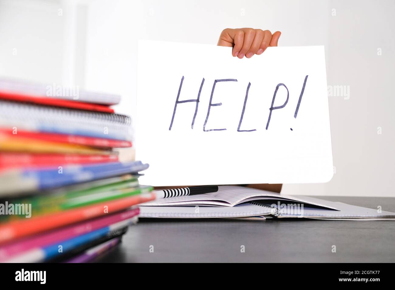 Help! Learning difficulties, school, education concept. Many books on ...