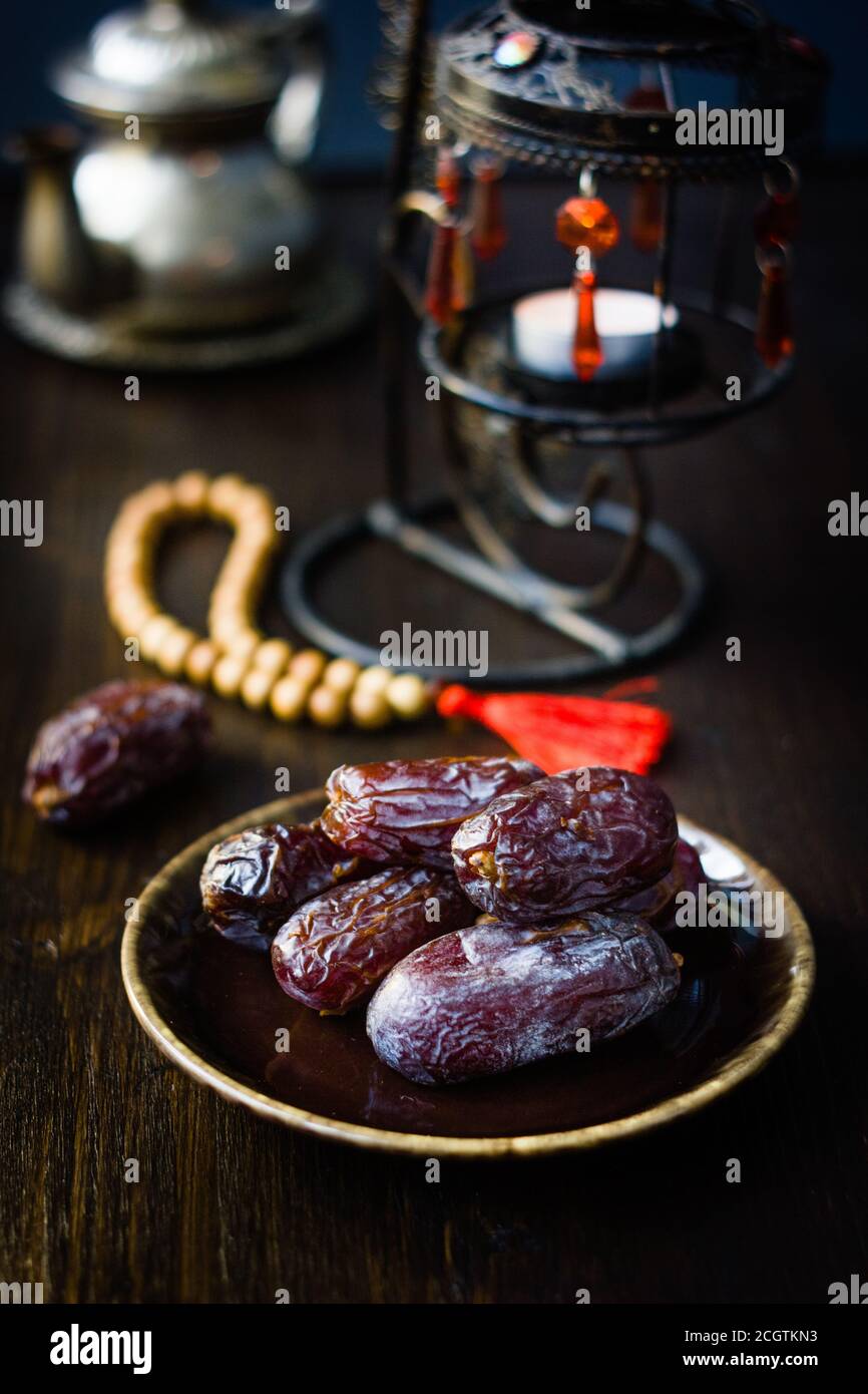 Ramadan dates for iftar opening on plate Stock Photo - Alamy