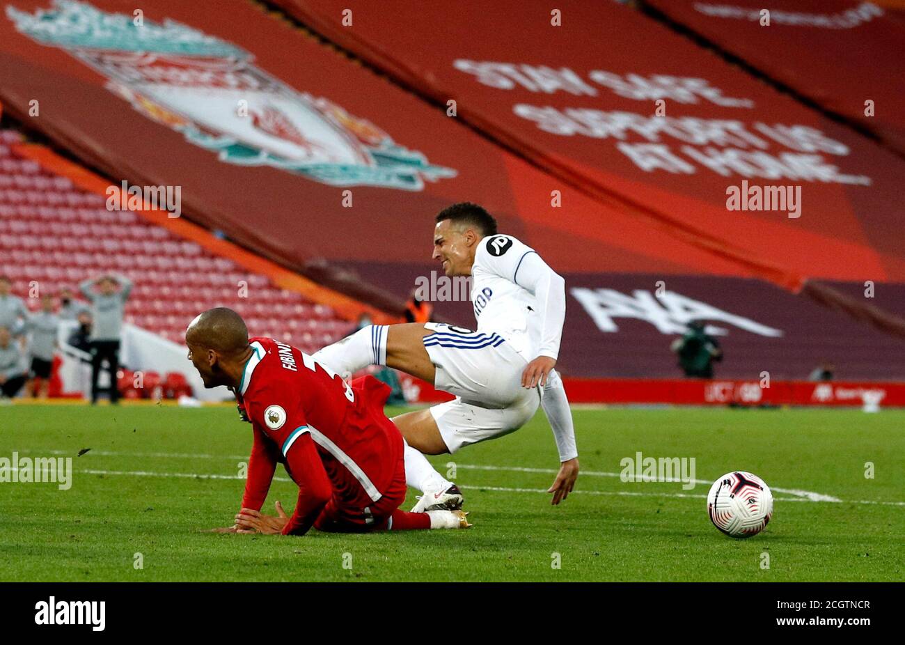 Leeds United's Rodrigo (right) brings down Liverpool's Fabinho inside ...