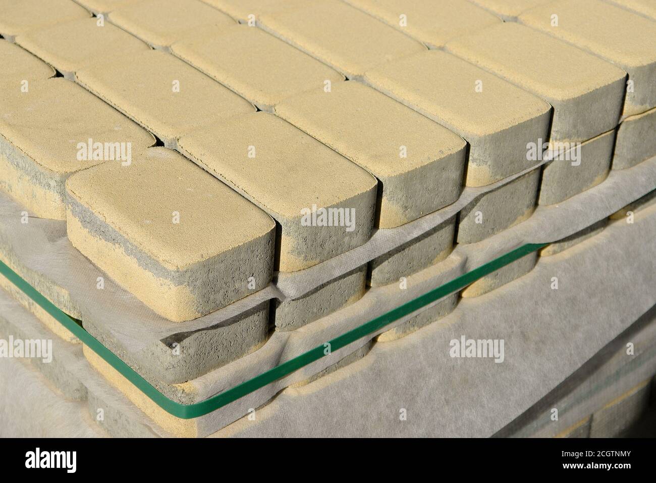 Pavement stones on market. Paving slabs store. Cobblestone on pallets ...