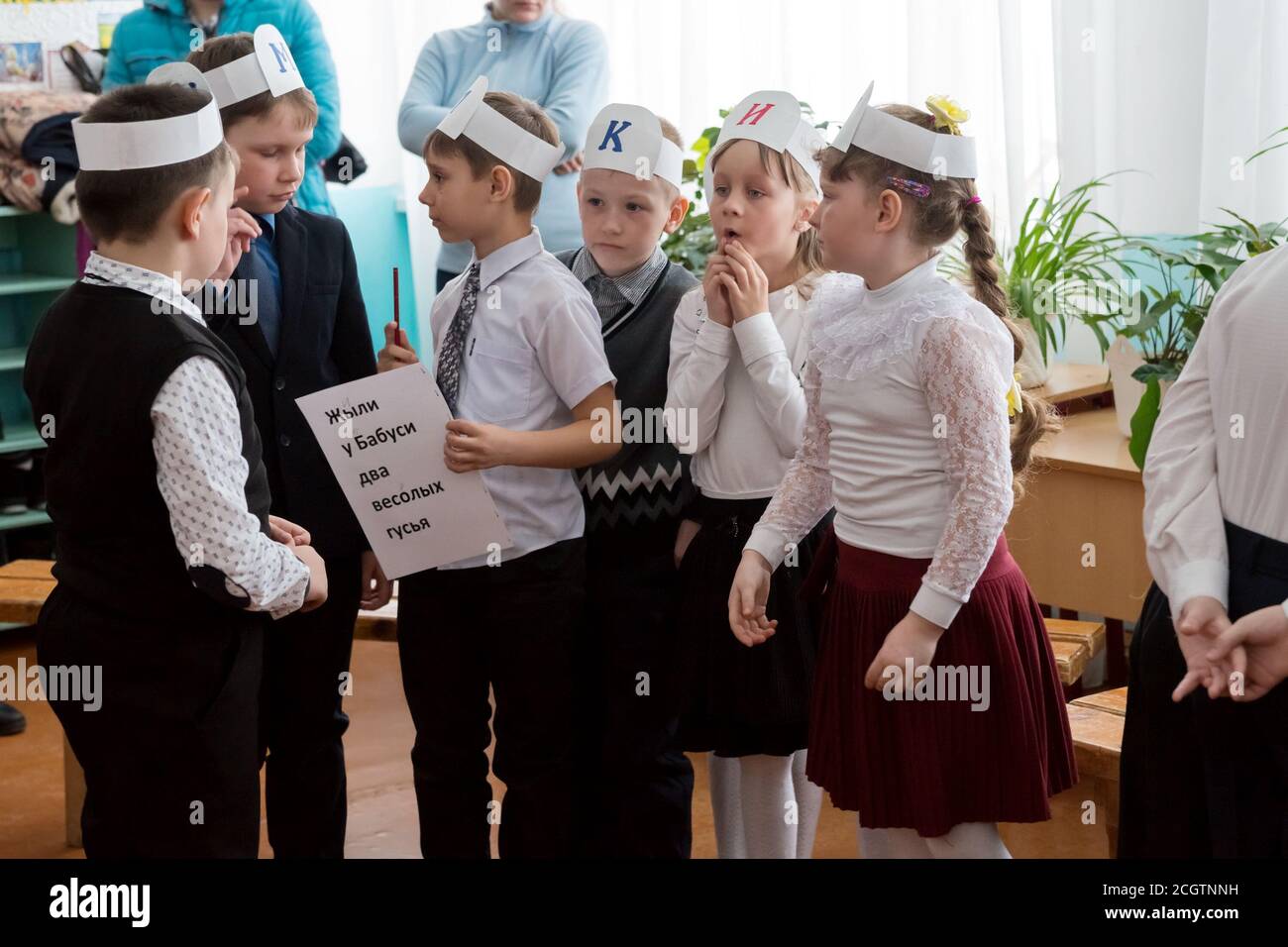 School children decide together task during the game thematic lesson in ...