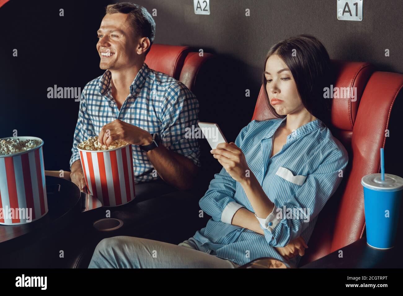 Bored movie audience hi-res stock photography and images - Alamy