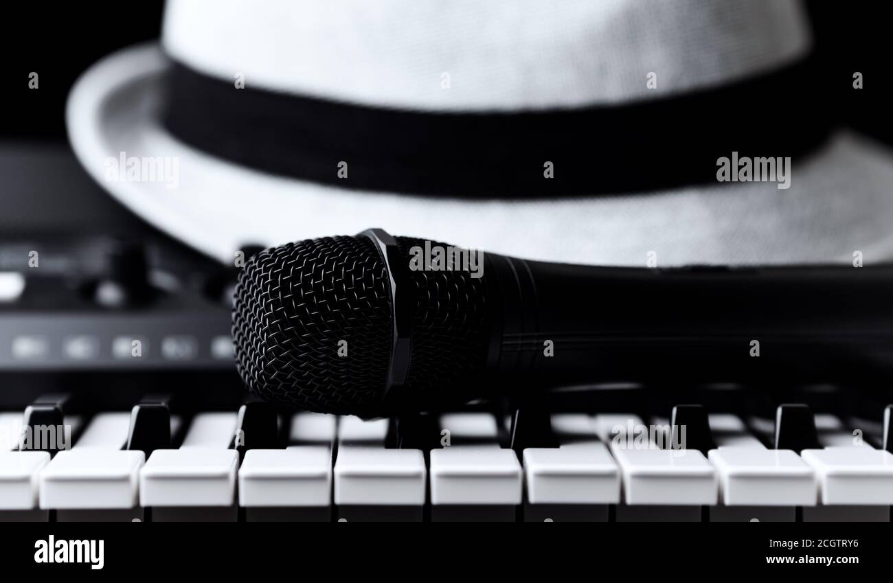 Microphone on keyboard . Close up Stock Photo - Alamy
