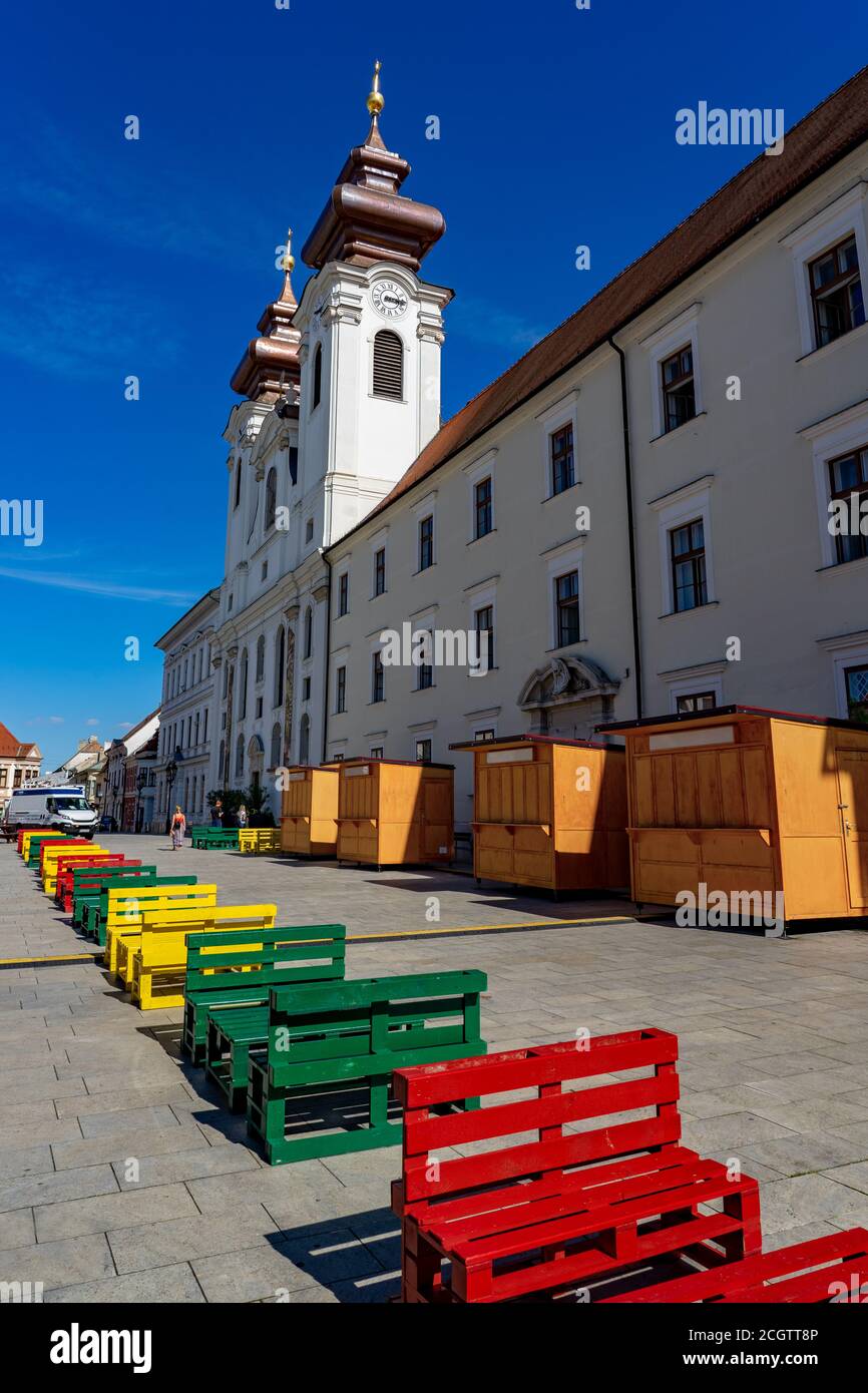 loyola saint ignatius church with colorful picnic benches at Gyor ...