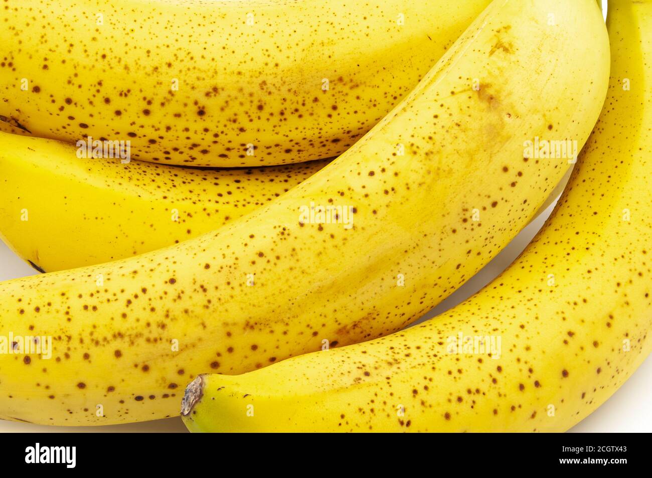 Spotted bananas. Ripened untreated Cavendish bananas full frame ...