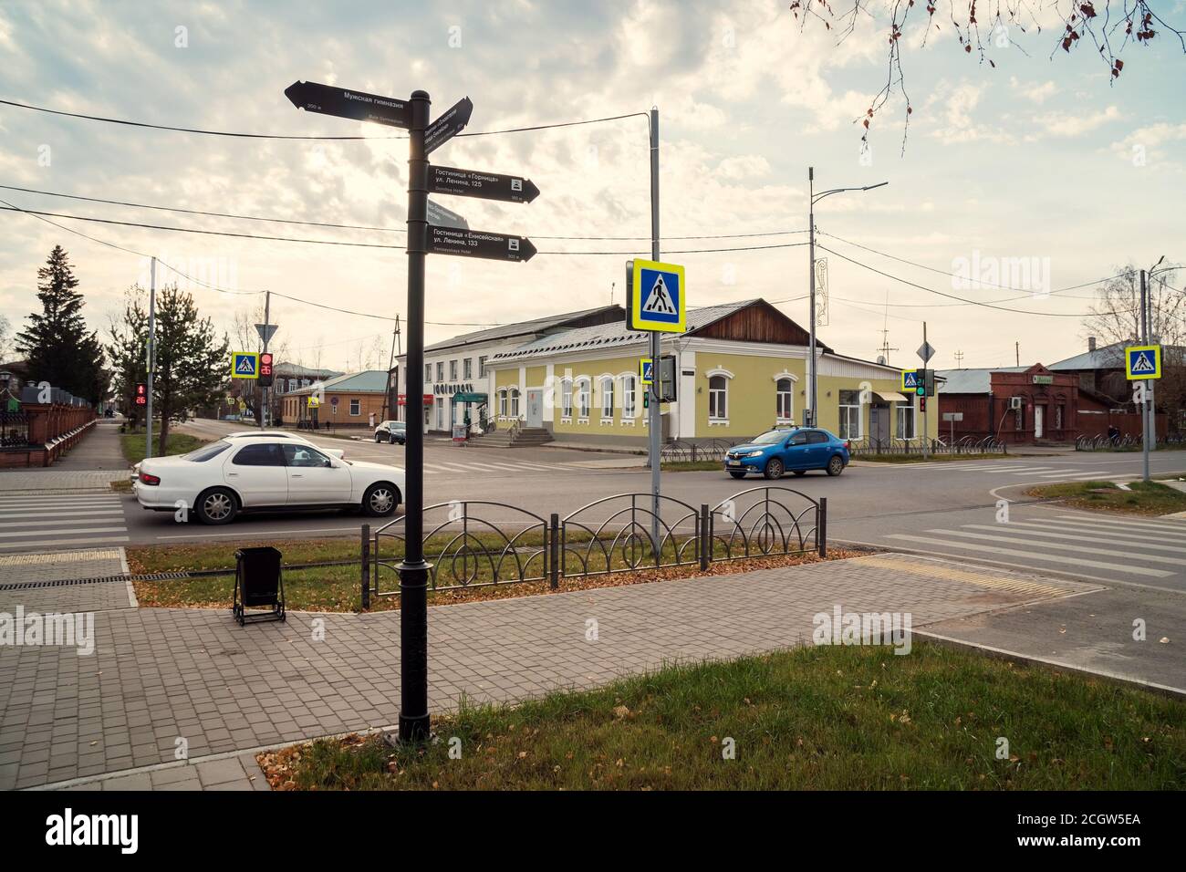 An information sign stands on the central square against the background ...