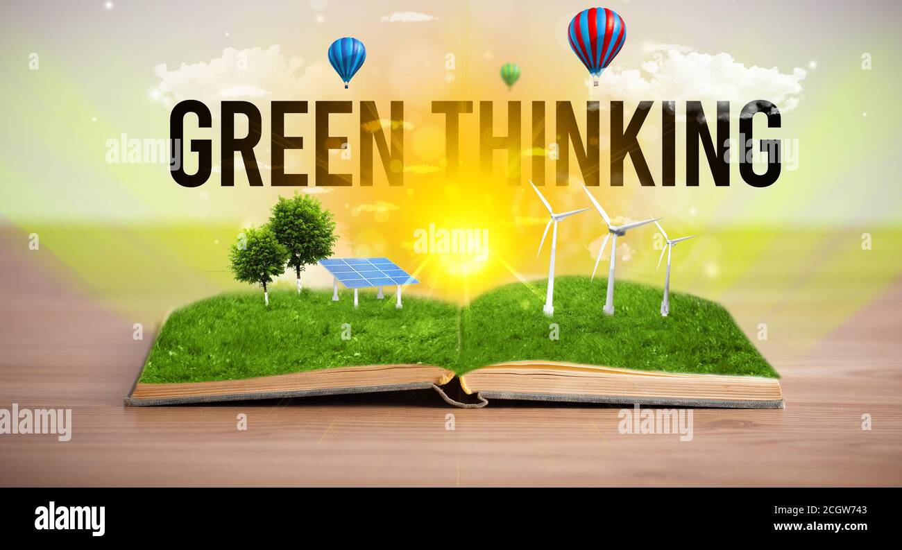 Open book with GREEN THINKING inscription, renewable energy concept ...