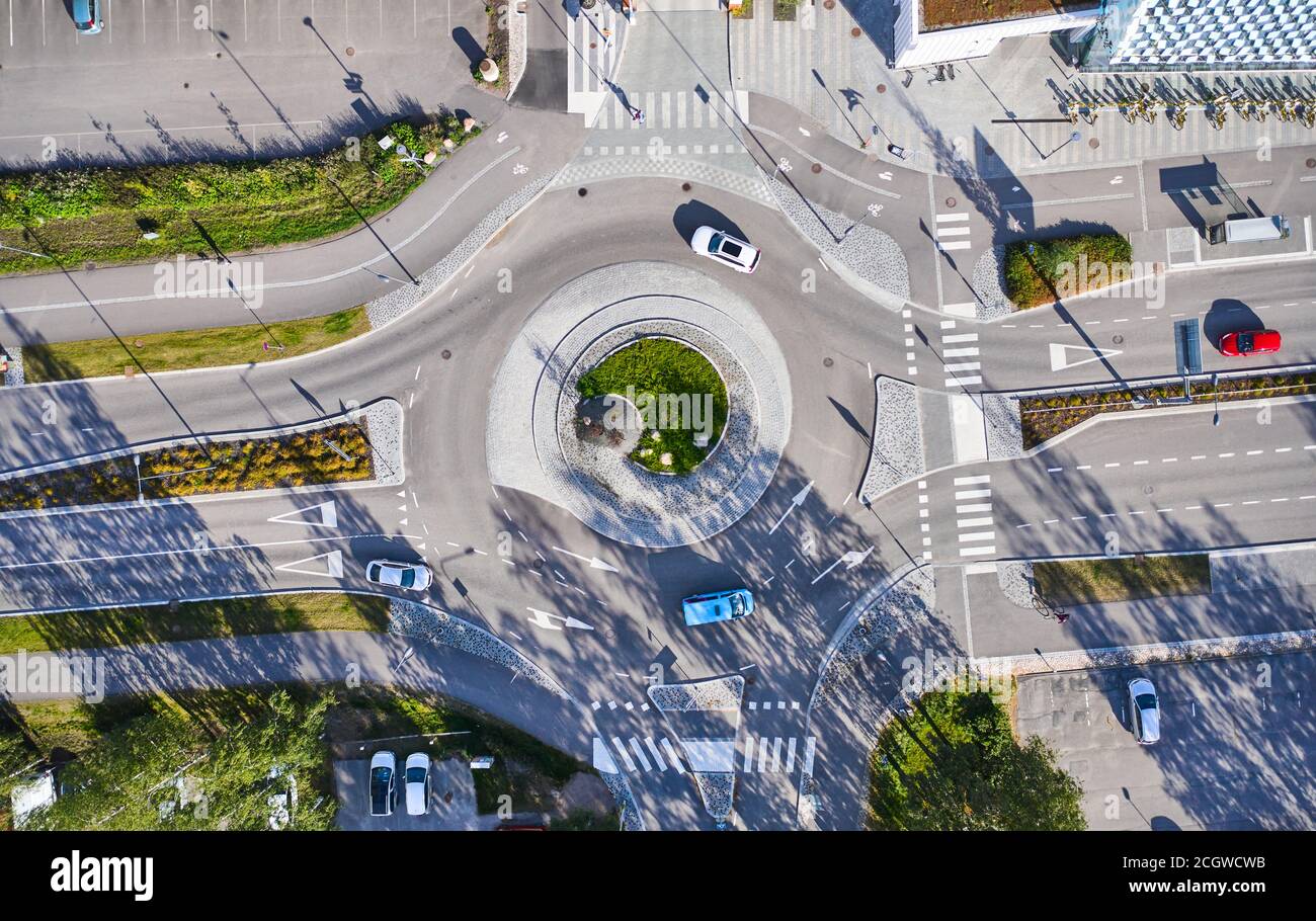 Aerial view of the roundabout. The cars moving on the roundabout. The ...