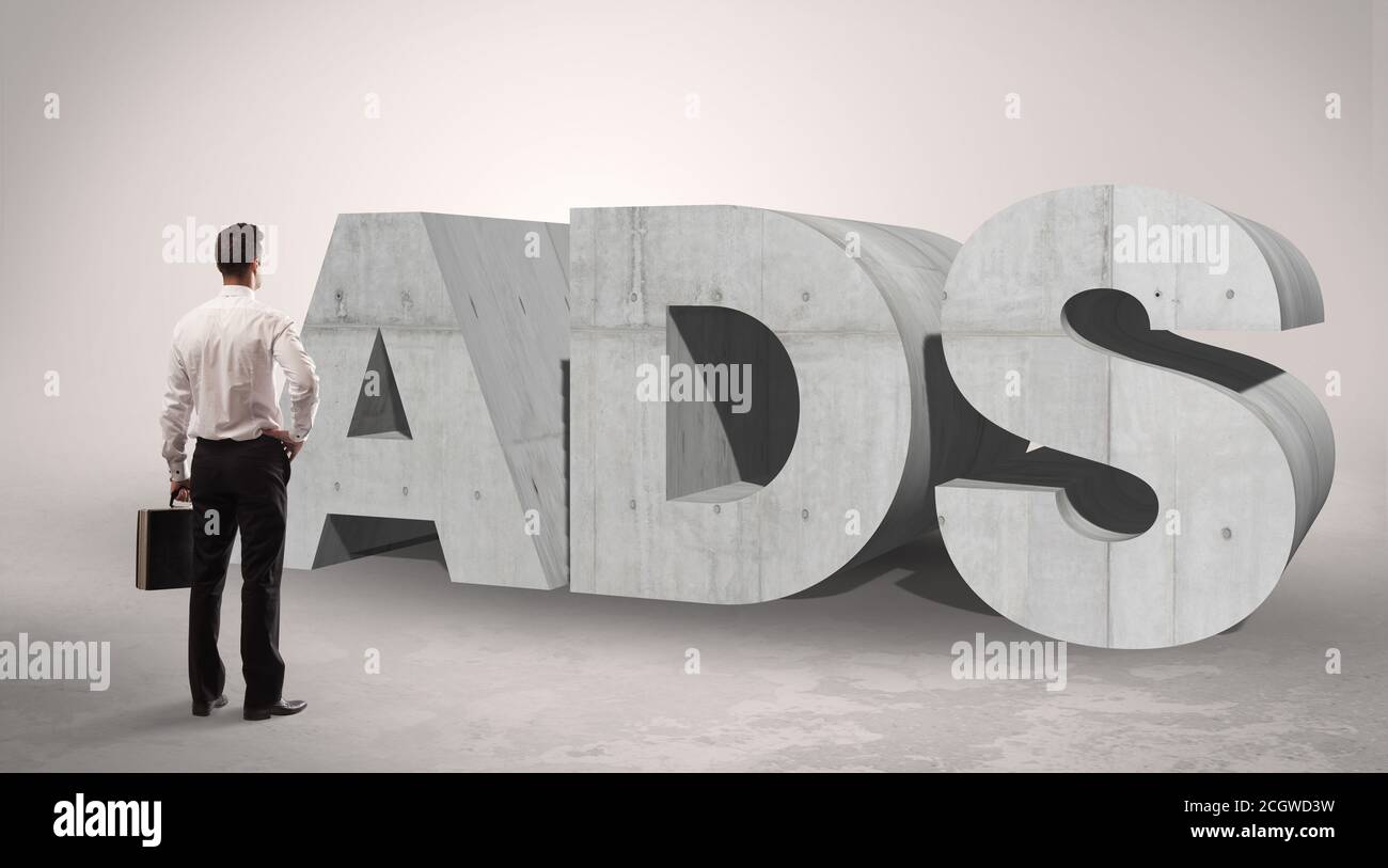 Rear view of a businessman standing in front of ADS abbreviation ...