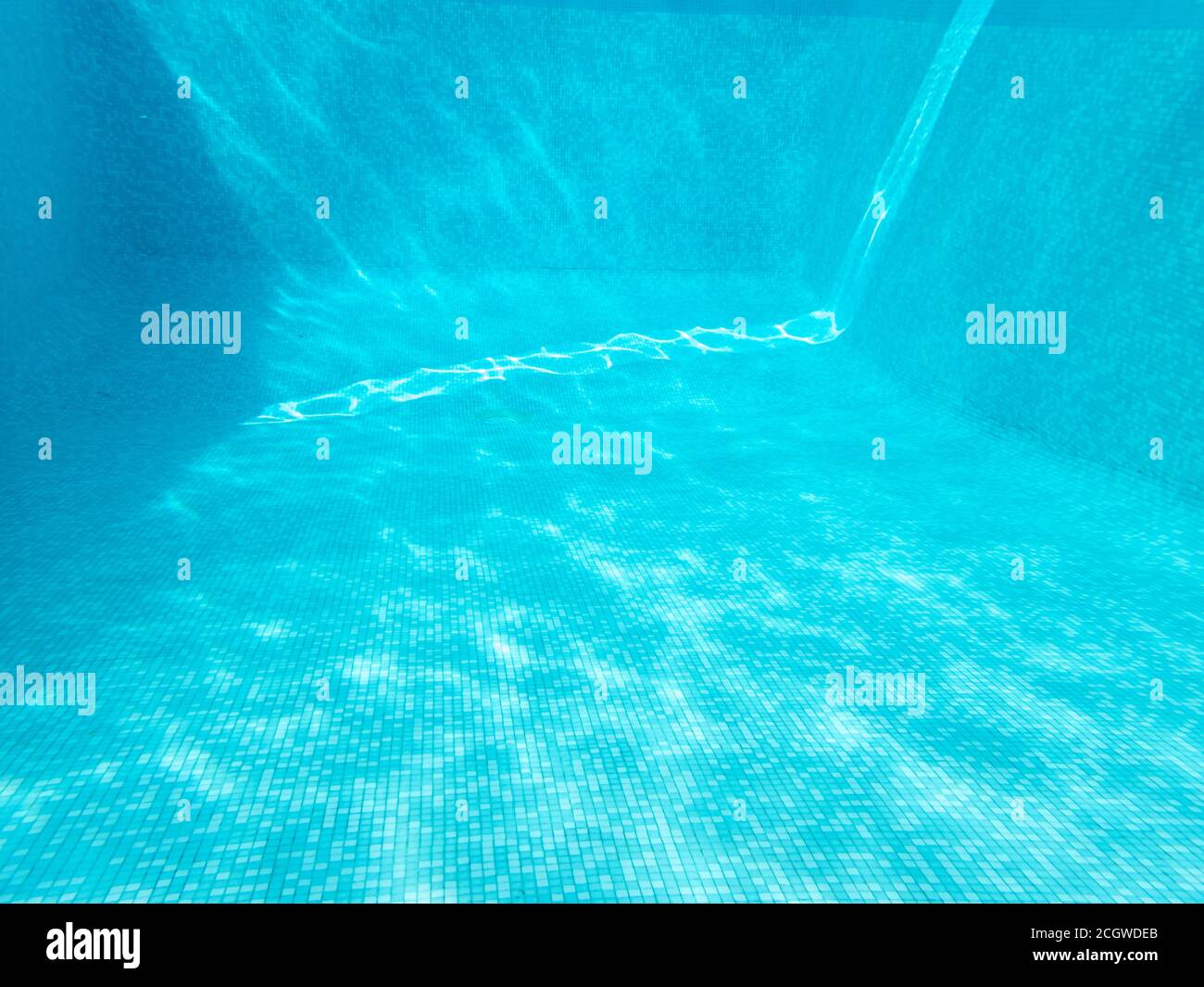 Clear blue water in a swimming pool in summer Stock Photo - Alamy