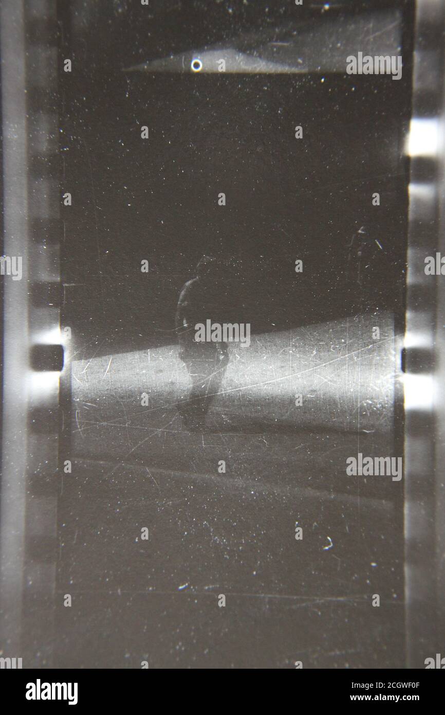 Fine 70s vintage black and white photography of a hazy ghost walking in ...