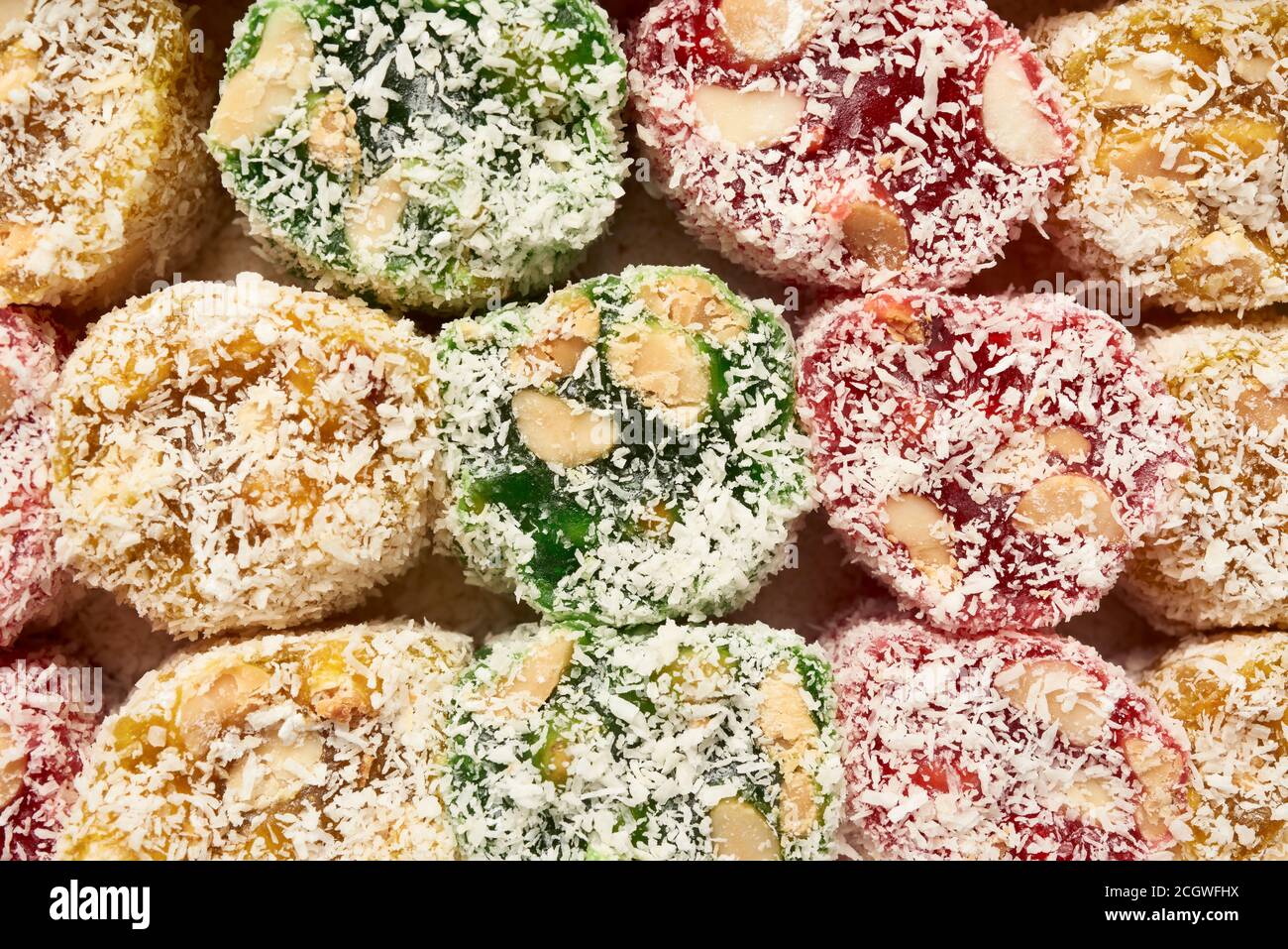 sweet Turkish delight in coconut white shavings, dessert lies in rows ...