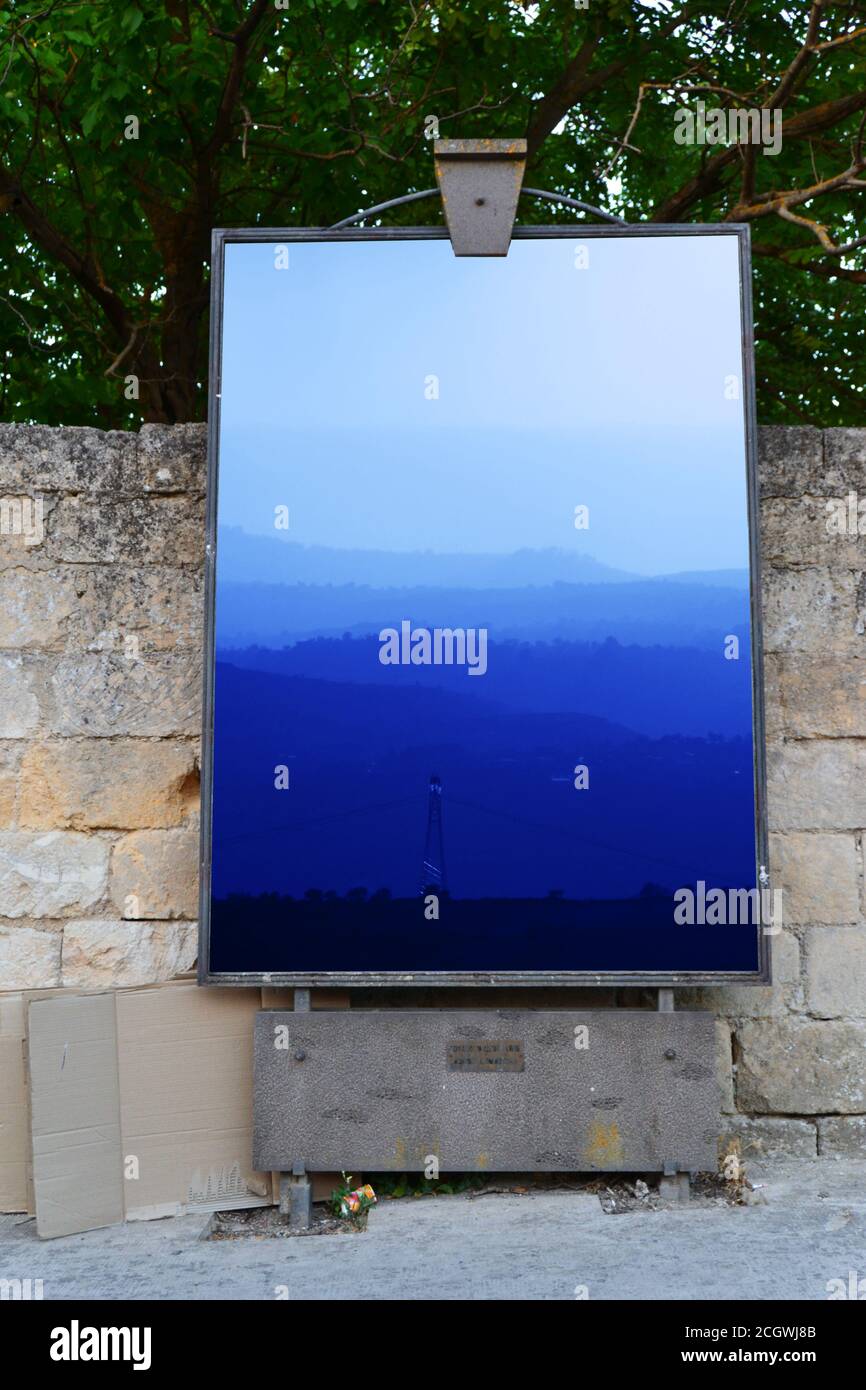 Notice board for poster posting.Mountains summer landscape with blue ...