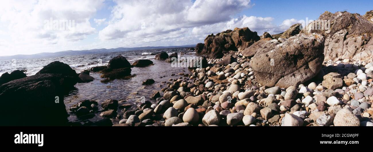 West coast with rock and beach on the Isle of Arran near Kings Cave ...
