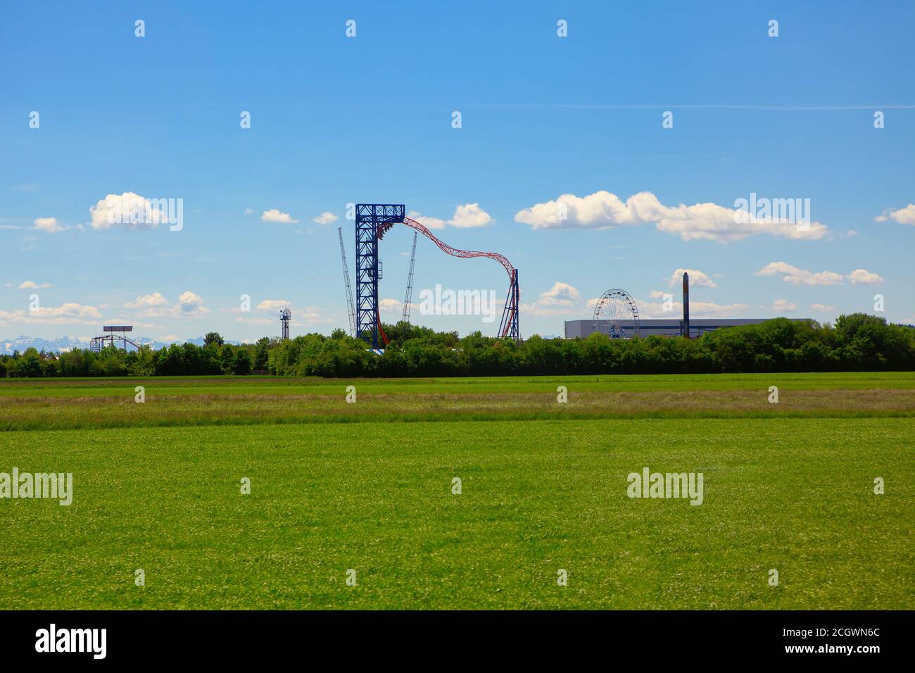 Amusement park with Feris Wheel Stock Photo - Alamy