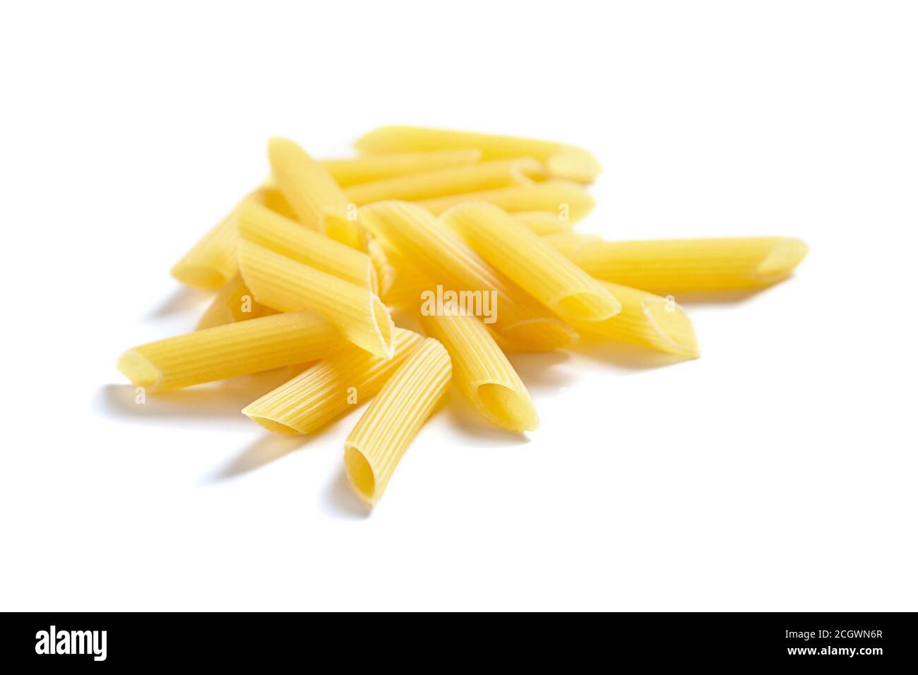 Uncooked penne rigate italian pasta, isolated on white background Stock ...