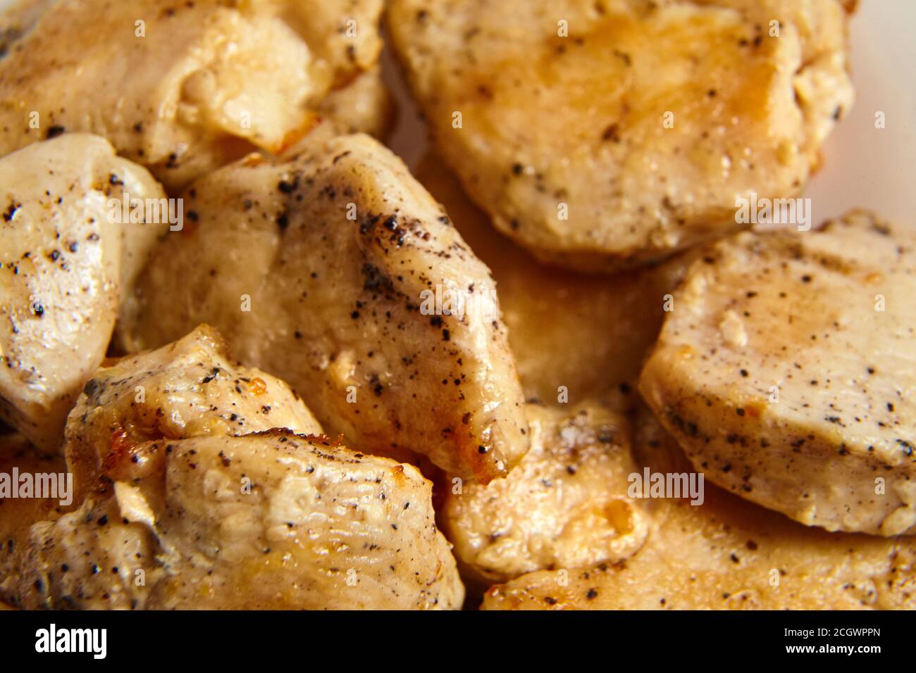 pieces of fried chicken fillet sprinkled with black pepper Stock Photo ...