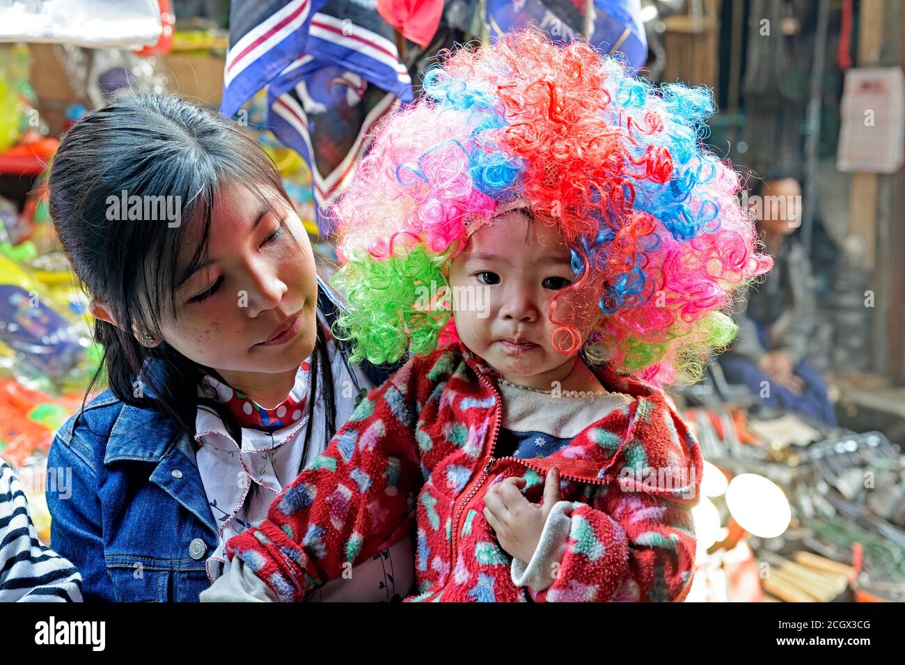 Trying on wigs hi-res stock photography and images - Alamy