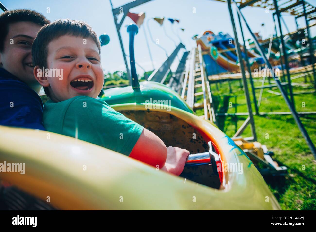 Cartoon children riding on roller hi-res stock photography and images ...