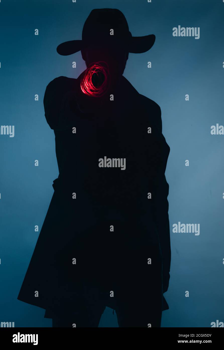 Man dressed cowboy gun hi-res stock photography and images - Alamy