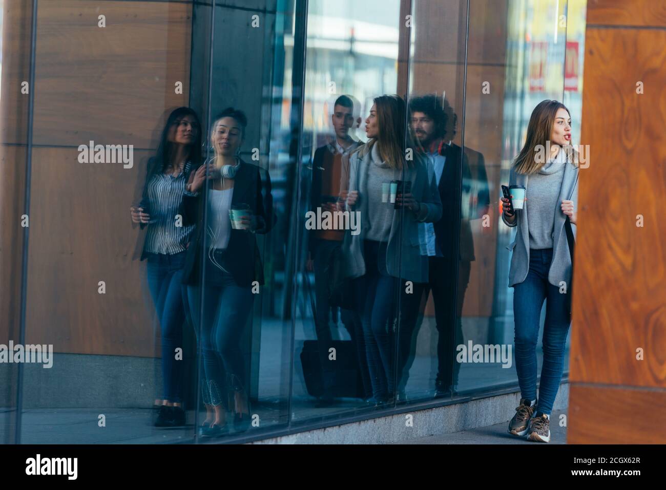 Group of colleagues on a business trip (euro trip) walking together at ...