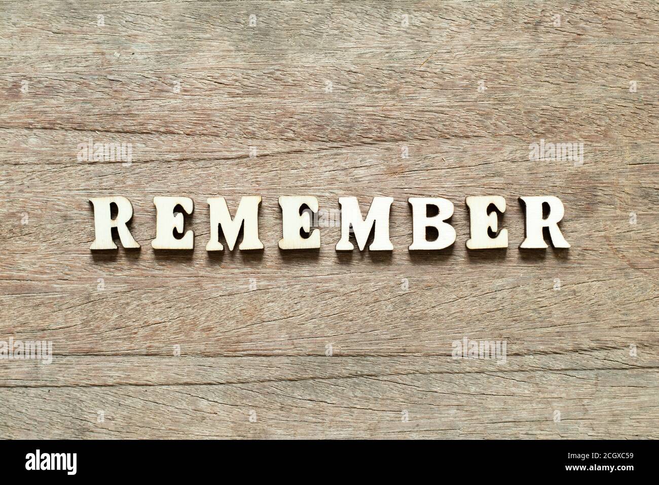Alphabet letter block in word remember on wood background Stock Photo ...