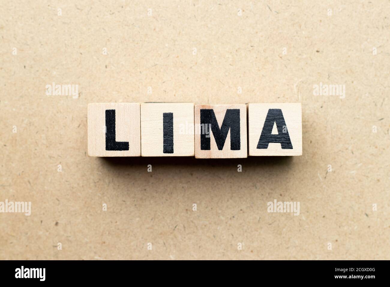 Letter block in word Lima on wood background Stock Photo - Alamy