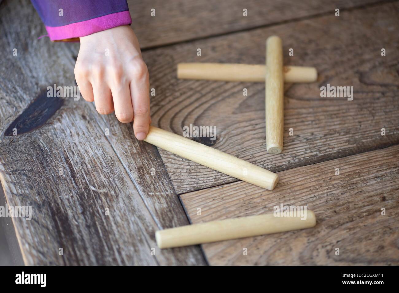 Woman hands holding stick'Yut'. Yut is Korean traditional game Stock ...