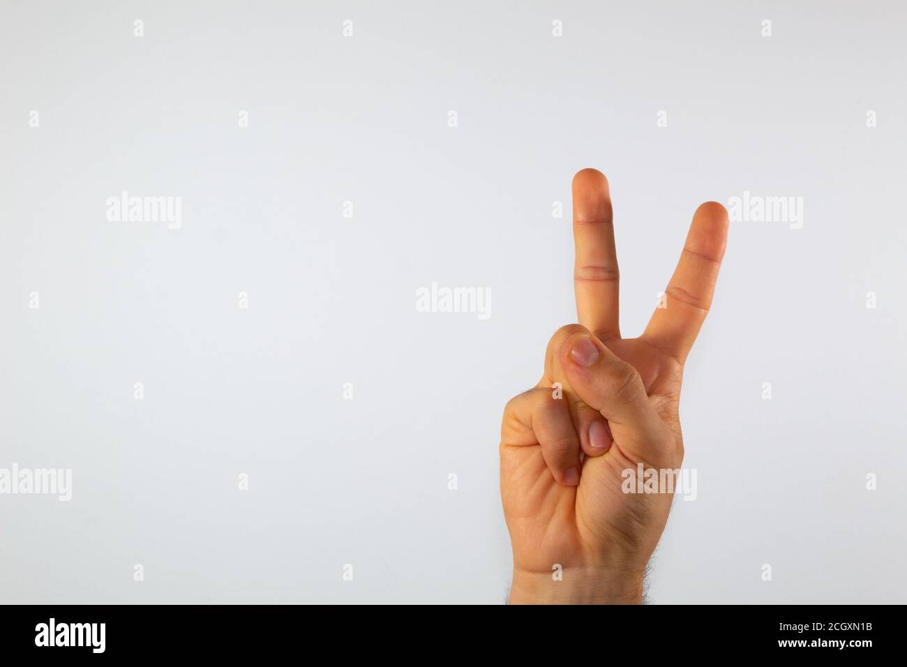 close up of a man's hand communicating with sign language, letters of ...