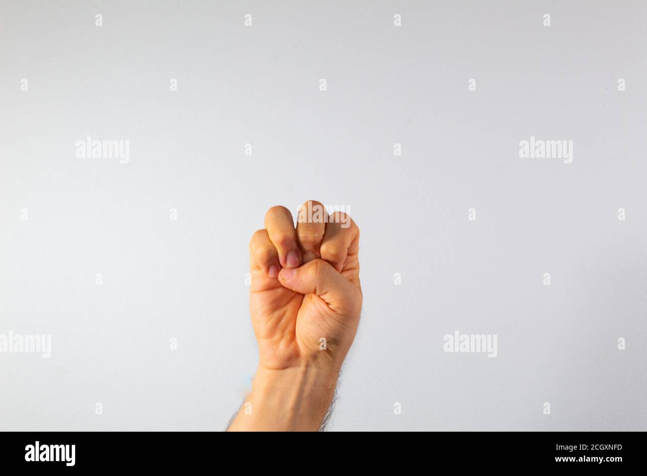 close up of a man's hand communicating with sign language, letters of ...