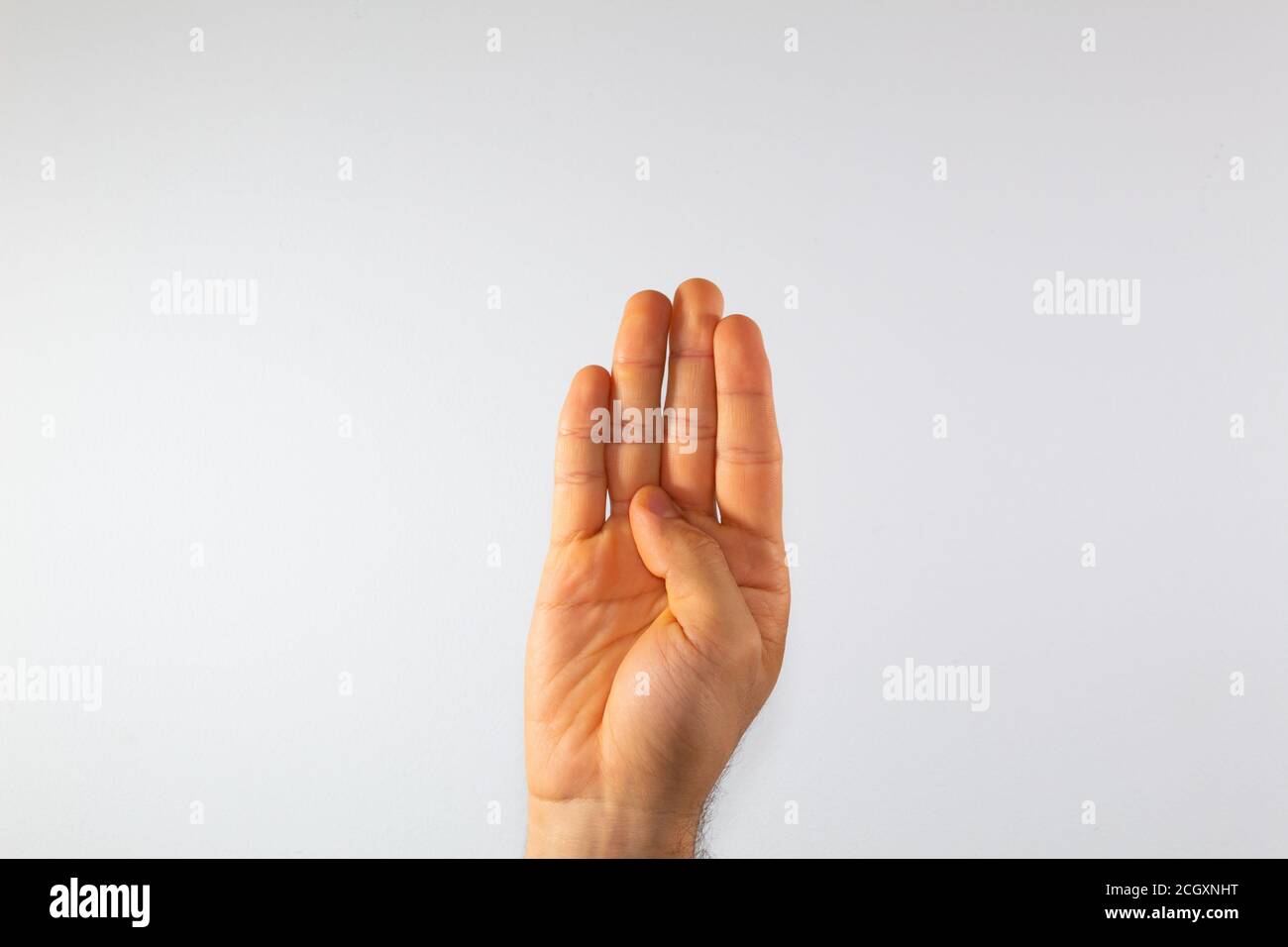 close up of a man's hand communicating with sign language, letters of ...