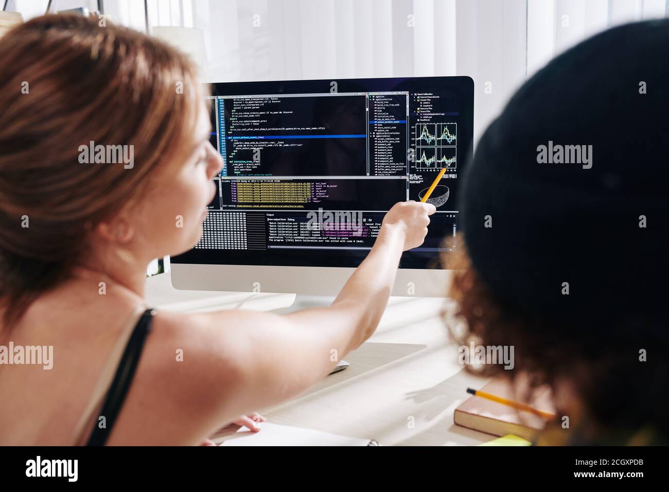 Teenagers studying programming Stock Photo - Alamy
