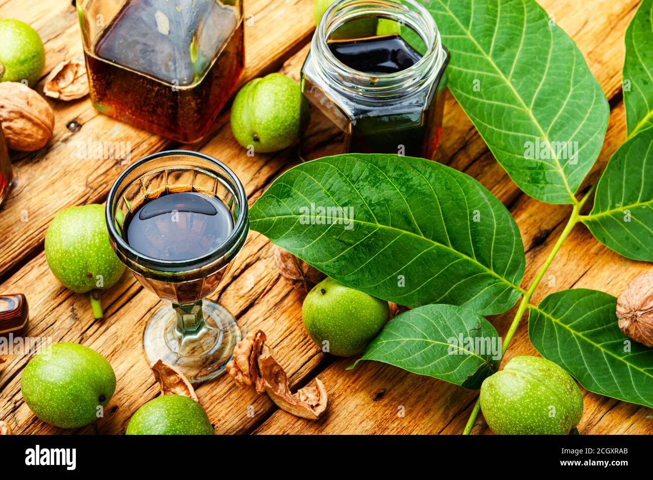 Healing tincture of unripe walnut.Green walnut in herbal medicine Stock ...