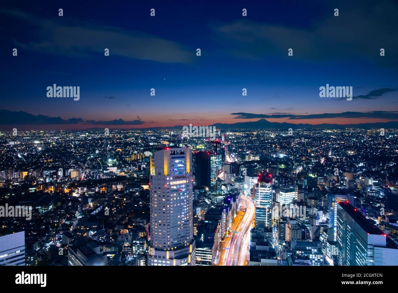 A dusk panoramic urban cityscape in Tokyo high angle wide shot Stock ...