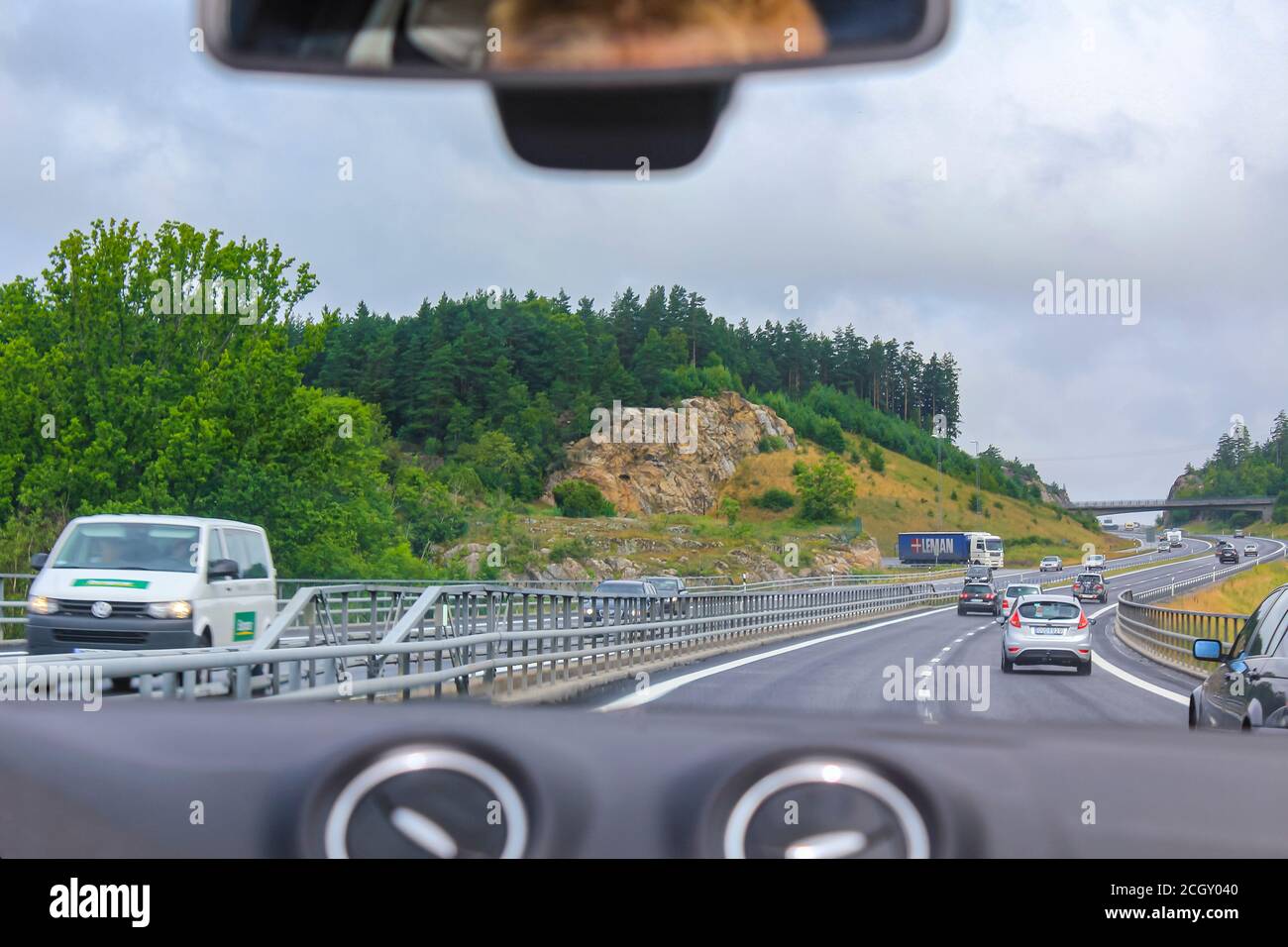 Driving through the Norway countryside in a car. Sitting in the car ...
