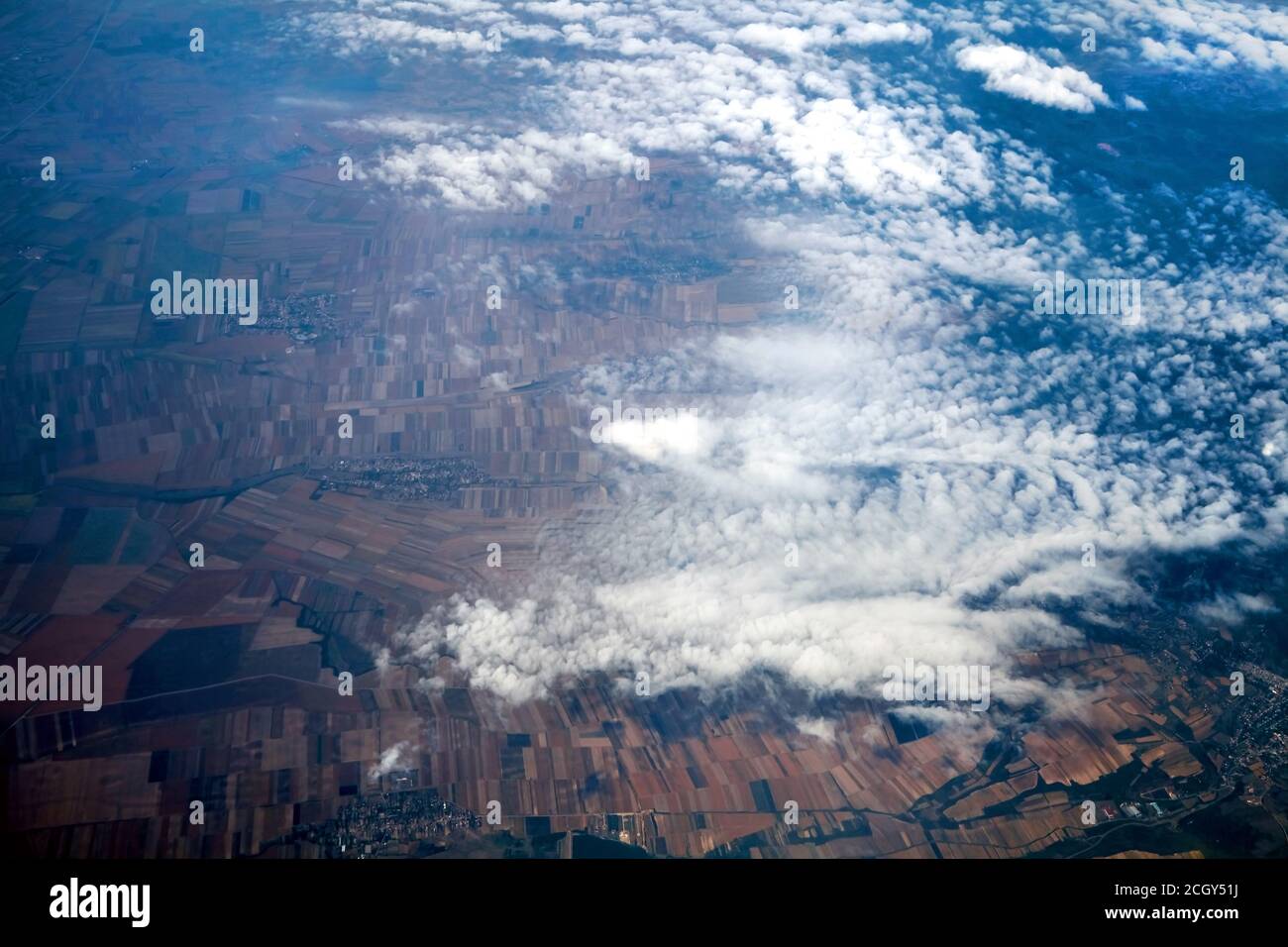 Beautiful aerial view of the land, fields, and clouds from above Stock ...