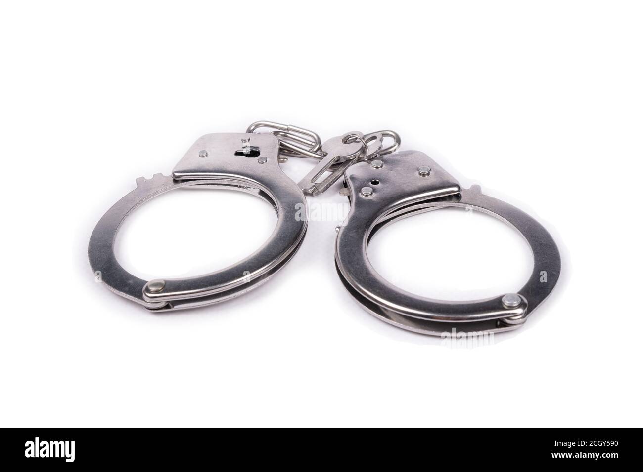 handcuffs isolated on white background Stock Photo - Alamy